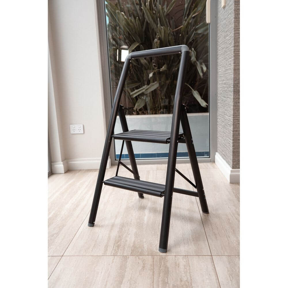 Compact folding step ladder store